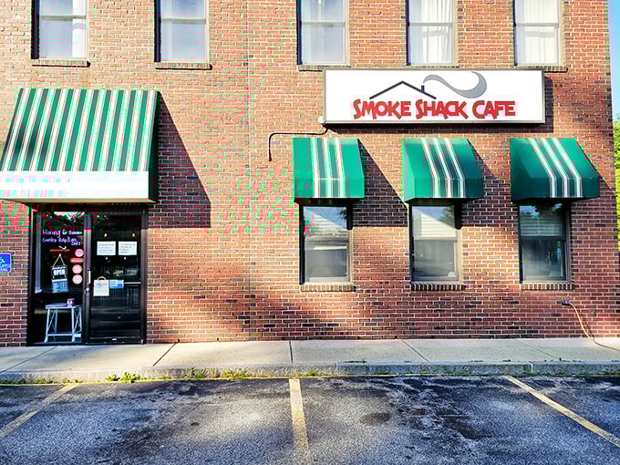 The Smoke Shack Cafe's vintage brick building houses modern BBQ magic. That pink pig logo promises delicious things inside!
