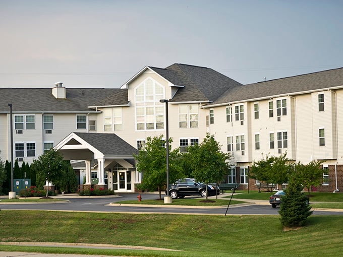 St. Joseph's Village nestled among trees like a hidden neighborhood where your retirement dollars stretch further than your gardening ambitions.