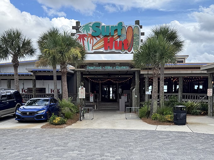 Surf Hut welcomes beach lovers with its colorful sign and promise of Gulf-to-table goodness just steps from the sand.