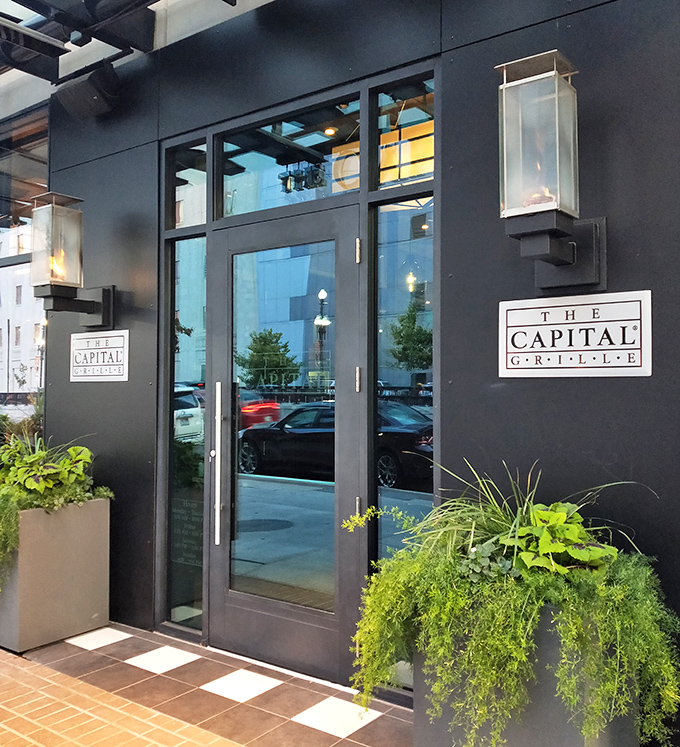 The Capital Grille's sleek entrance looks ready for a red carpet. Even the plants are dressed for dinner!