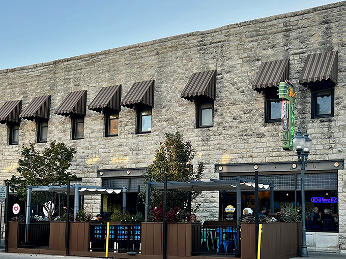 Stone walls that have weathered decades still stand strong, sheltering Manhattan's breakfast traditions with timeless grace.