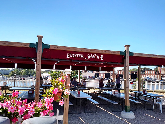The Lobster Shack's covered dining area offers shade for your sunburned shoulders and butter for your lobster roll.