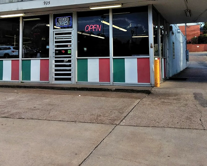 The Pizza Shack's humble facade proves that great food doesn't need fancy packaging to shine.