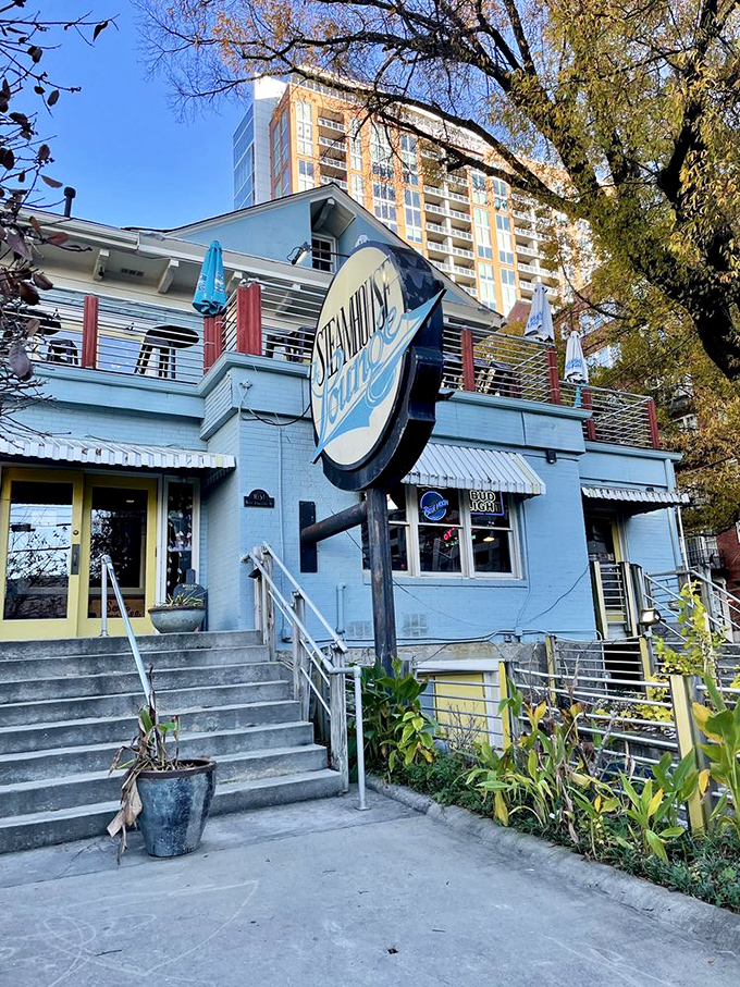 That oversized frying pan sign against blue walls announces you've arrived at Atlanta's answer to coastal seafood heaven.