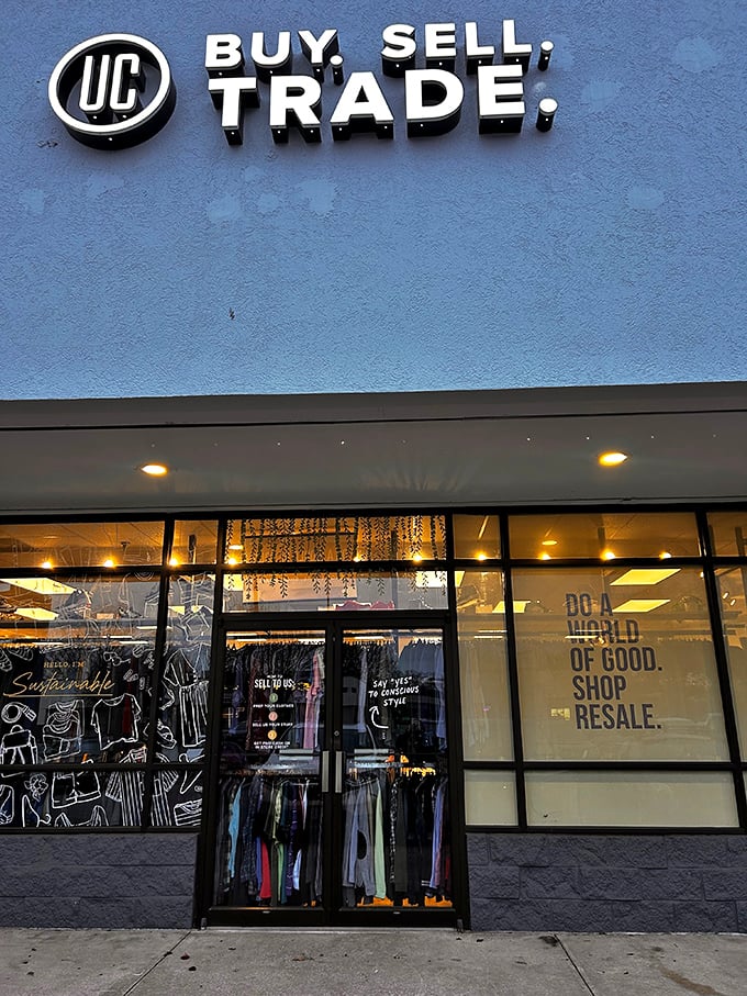 Uptown Cheapskate's sleek blue storefront brings boutique vibes to the secondhand shopping experience.