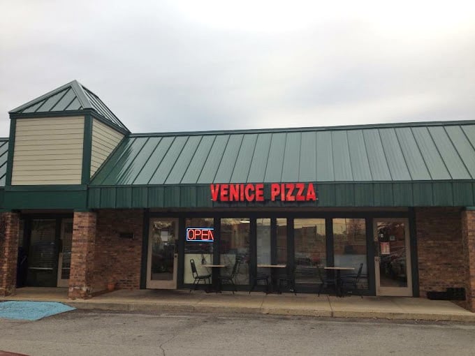 Strip mall magic happens here - proof that great pizza doesn't need fancy addresses.