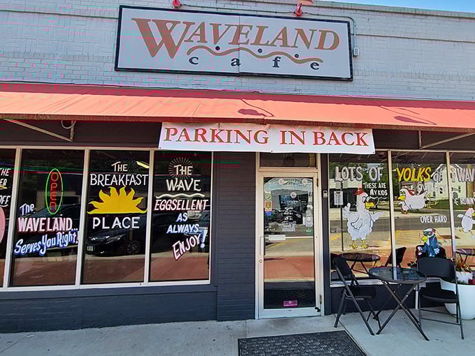 Waveland Cafe's colorful window art hints at the personality inside. Where egg puns and serious breakfast skills create morning magic in Des Moines.