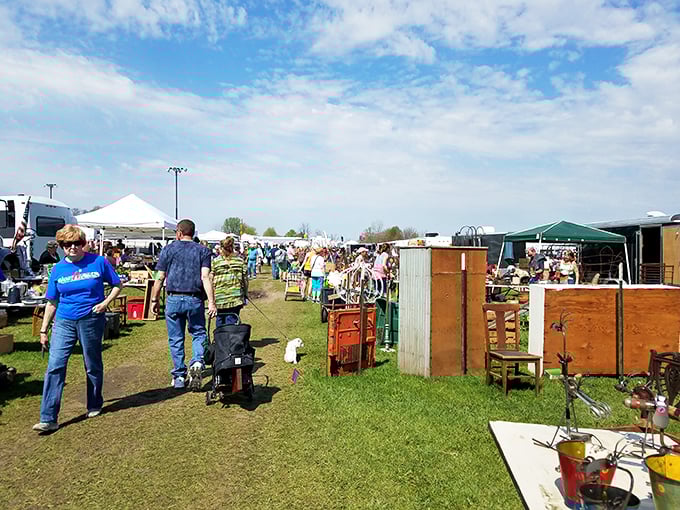 Tables overflow with finds while shoppers stroll through outdoor aisles, hunting for that one perfect piece they didn't know they needed.
