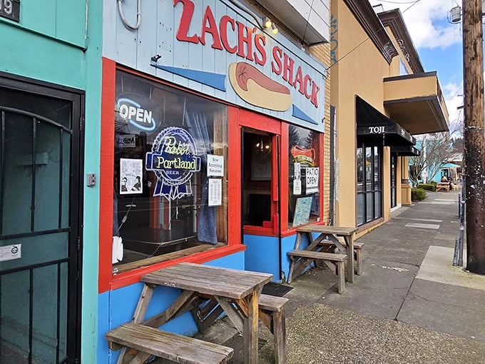 Zach's Shack's vibrant storefront promises hot dog adventures with its bold red and blue color scheme. Portland's late-night savior!