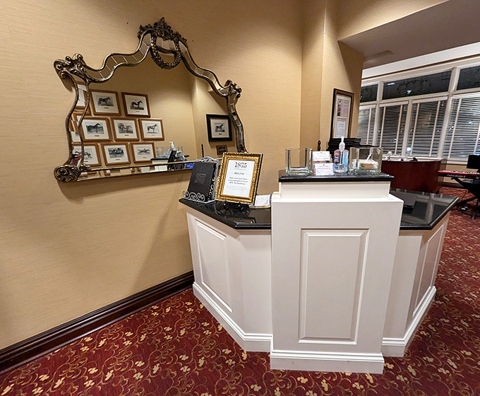 The elegant reception area at 1875 whispers "special occasion" before you've even seen a menu.