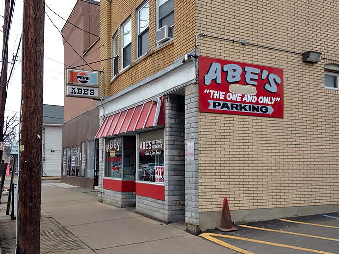 Red awnings and honest signage: when a place calls itself legendary, you better believe it.s barre)