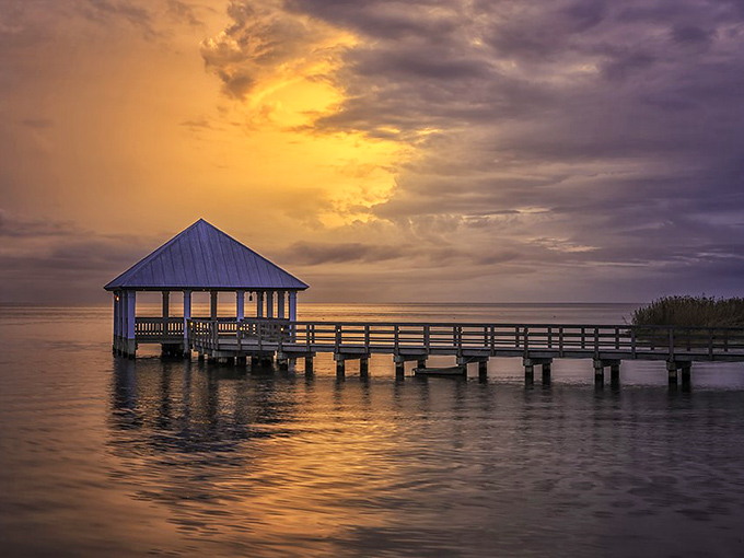 Morning light bathes the harbor pavilion, where fishing traditions continue just as they have for generations.