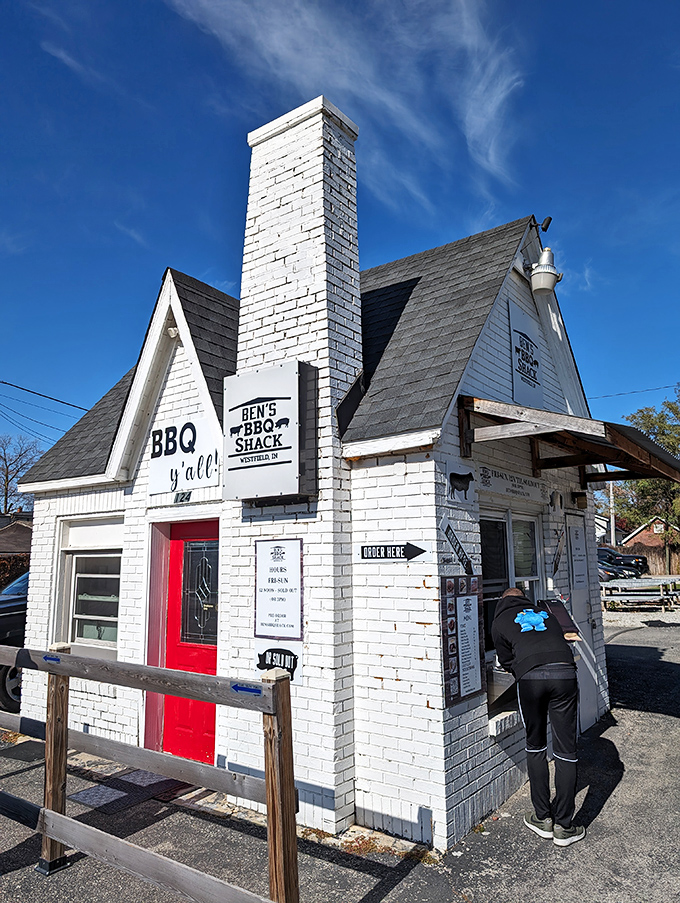 The little white BBQ house with the bright red door &ndash; like Snow White's cottage if she'd discovered the joy of smoked brisket instead of apples.