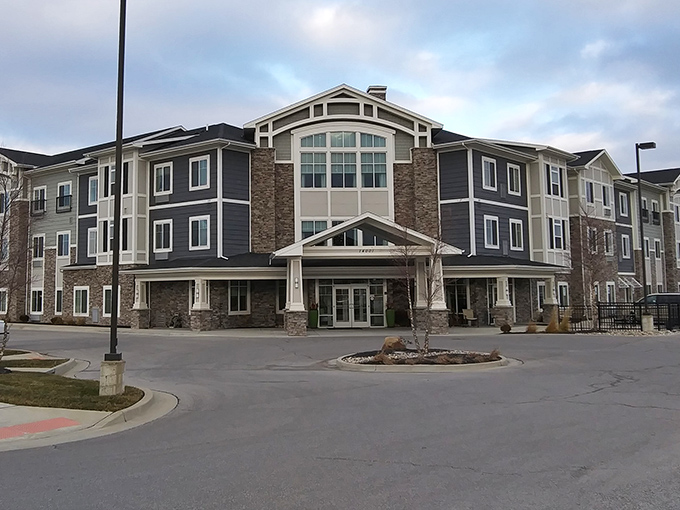 Curved walkways and manicured lawns create a resort feel without the resort price tag headaches.