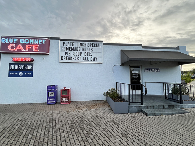 That classic diner entrance practically guarantees fluffy pancakes and coffee strong enough to wake the neighbors.