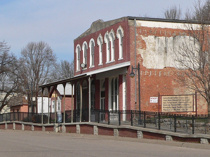 Brownville's brick storefronts stand like faithful sentinels, protecting the town's peaceful atmosphere from the outside world's endless rush.