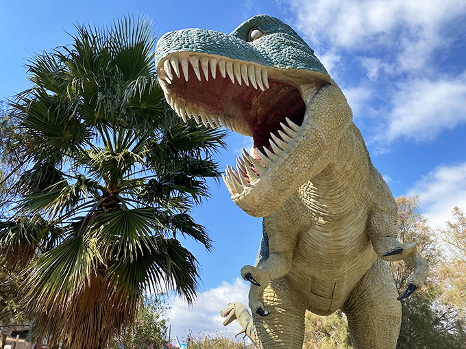 This T-Rex's terrifying grin welcomes travelers to Cabazon, where dinosaurs still rule the desert landscape.
