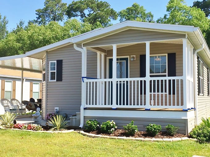 Cozy cottage living at Century Oaks proves good things come in smaller packages. That porch is calling your name!