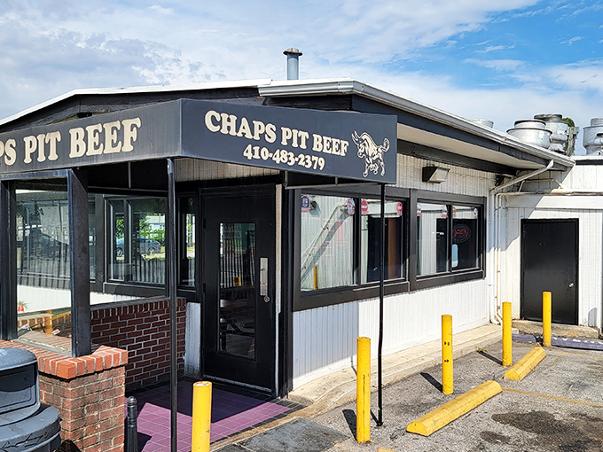 This weathered exterior houses pit beef perfection that's been smoking since your parents were dating.