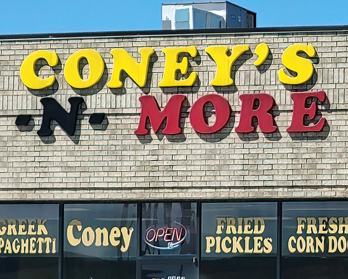 Fresh corn dogs and fried pickles await behind those cheerful windows like edible sunshine.