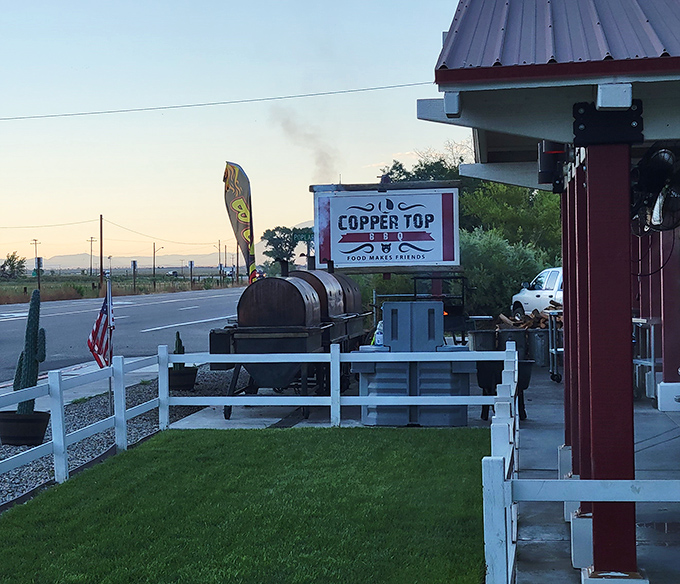 Copper Top BBQ stands proud against the Eastern Sierra backdrop, where smoke signals announce "great food ahead."