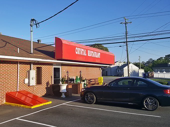 The red awning waves you in like a friendly neighbor inviting you for coffee.