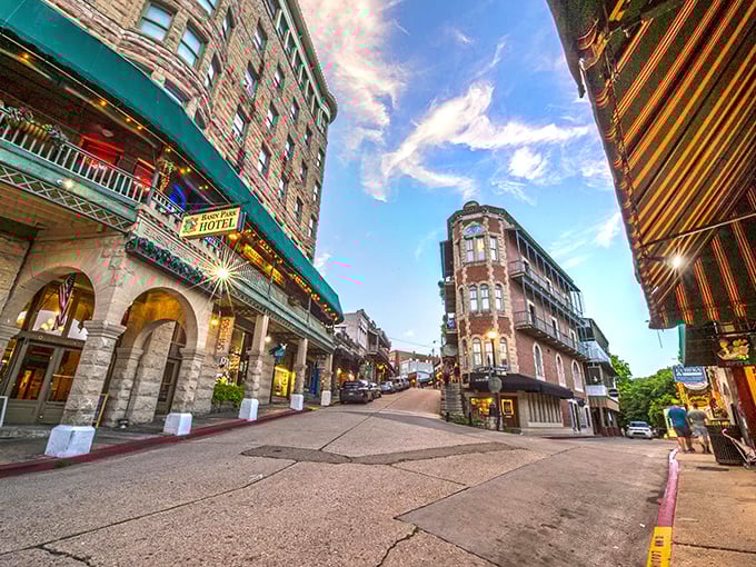 The iconic flatiron building anchors Eureka Springs' quirky downtown, where Victorian architecture clings dramatically to Ozark hillsides.