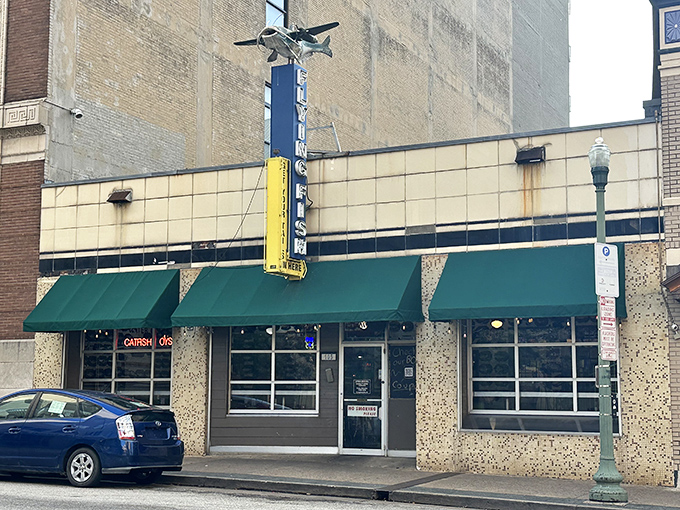 Flying Fish (storefront): "Urban seafood oasis. Those green awnings and neon signs promise a casual seafood experience that delivers big on flavor."