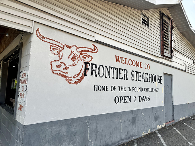 That weathered exterior tells stories of countless satisfied customers who've conquered mountains of perfectly grilled beef.