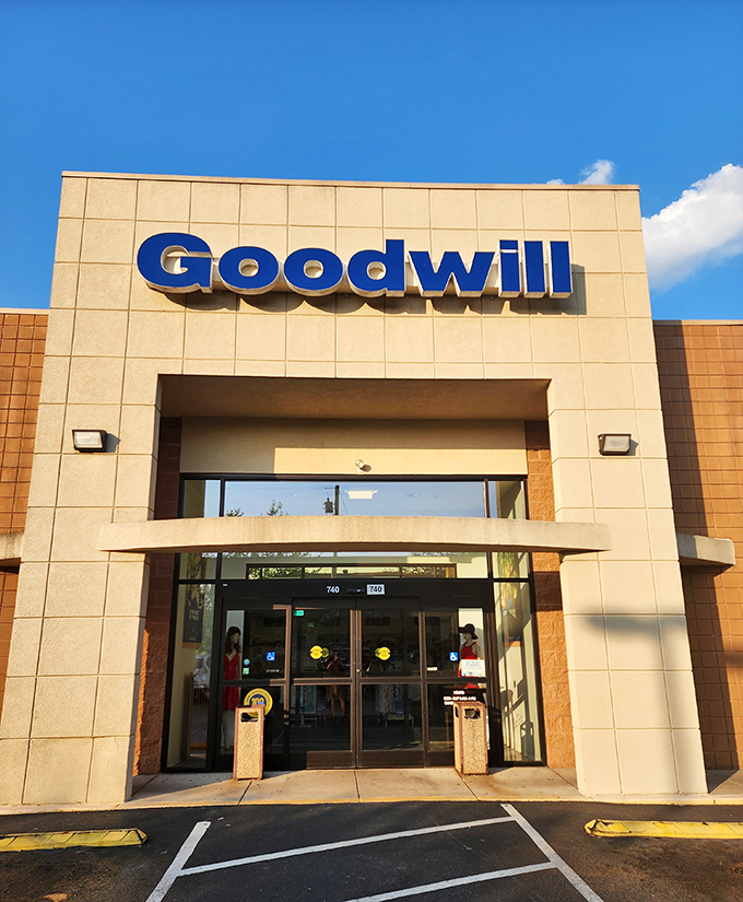 The blue Goodwill sign shines like a beacon for bargain hunters. Your wallet will thank you for the detour.