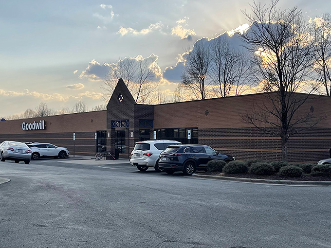 Dusk settles over this Goodwill location, but the hunt for bargains continues. Even the clouds seem to approve of this thrifting destination.
