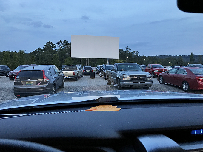 Cars perfectly arranged like notes on sheet music. Grand River Drive-In orchestrates an evening of big-screen harmony.