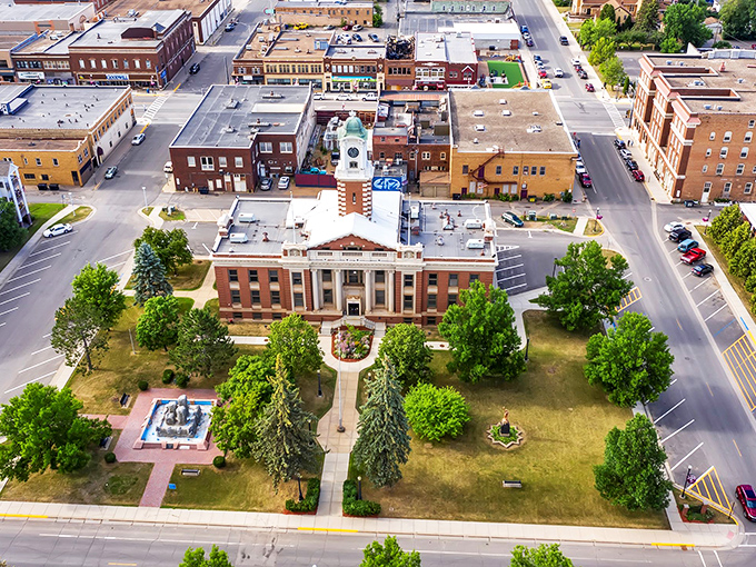 An aerial view of Hibbing highlights its stately courthouse and tree-lined downtown &mdash; a proud reflection of small-town Minnesota heritage.