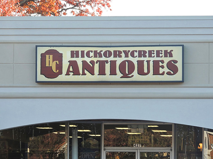 That welcoming storefront says "serious antique business here" - step inside where collectors' dreams come true in downtown Ashland.