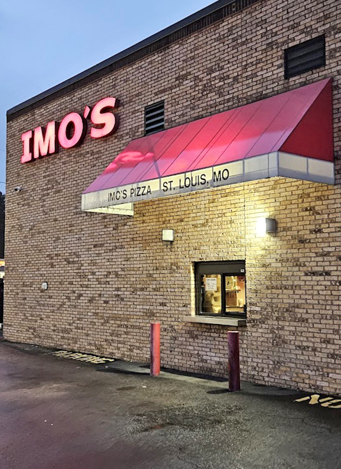 That red-and-pink awning combo says "we've been feeding families since before you were born."