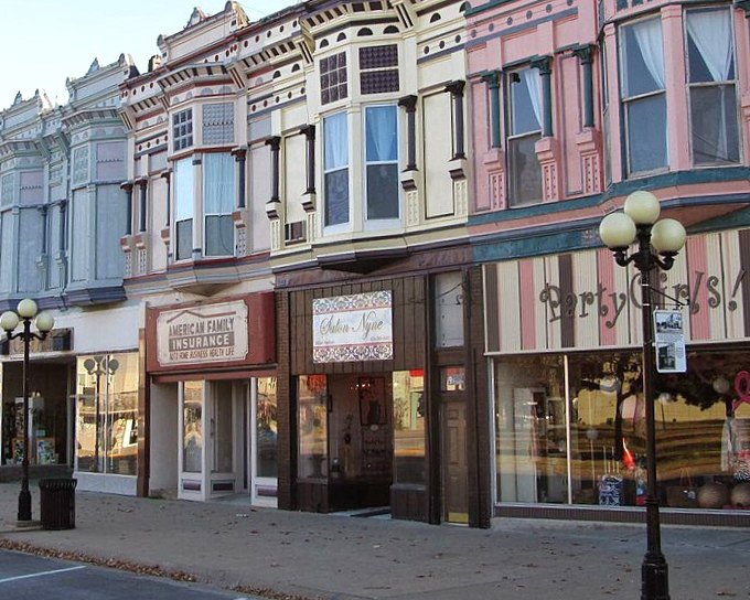 Iola's downtown storefronts welcome shoppers with awnings that seem to say, "Come in, stay awhile, we've got all afternoon."
