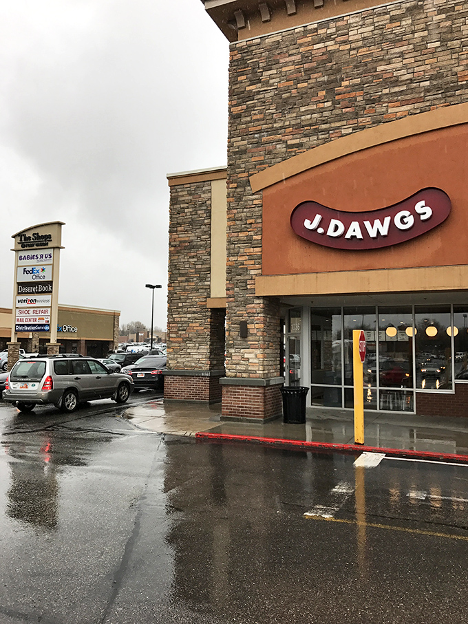 The stone facade whispers "quality" while the J.Dawgs sign practically shouts "delicious" to passersby.