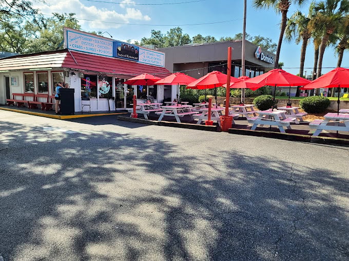 When a seafood spot has outdoor seating this inviting, you know the food's worth the wait.