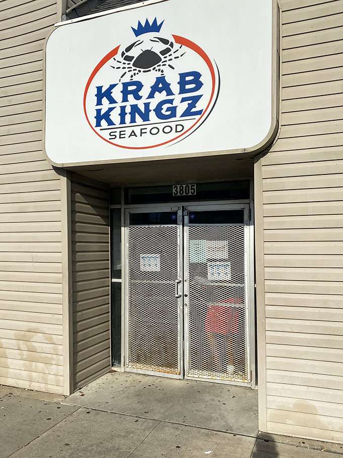 Behind those security gates lies a seafood kingdom where crabs reign supreme and messy eating is absolutely encouraged and celebrated.