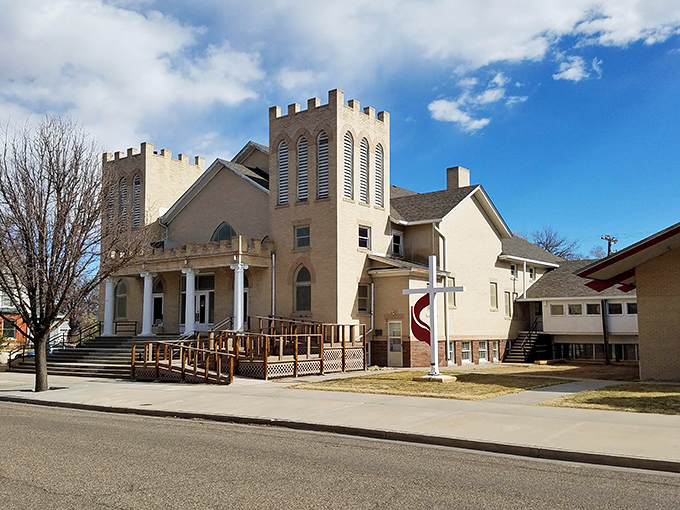 This historic church anchors the community, its twin towers reaching skyward like faithful sentinels.