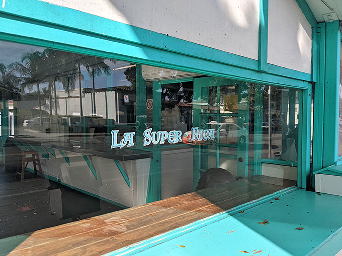 That turquoise beacon calls to taco lovers like a siren song of authenticity.