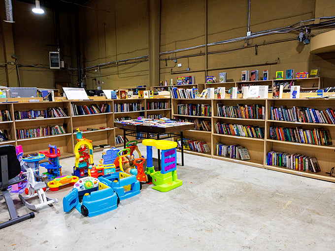 Books and toys organized like a library meets toy store - browsing heaven for families.