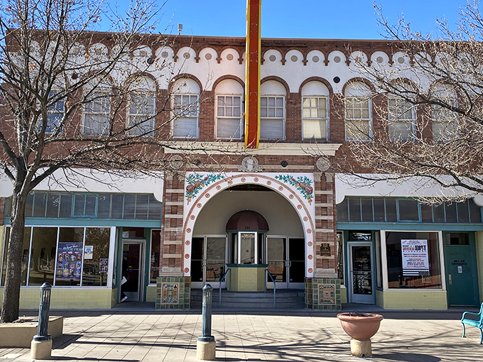 The turquoise trim pops against terracotta walls in downtown Las Cruces, where architectural details are as flavorful as the local chile.