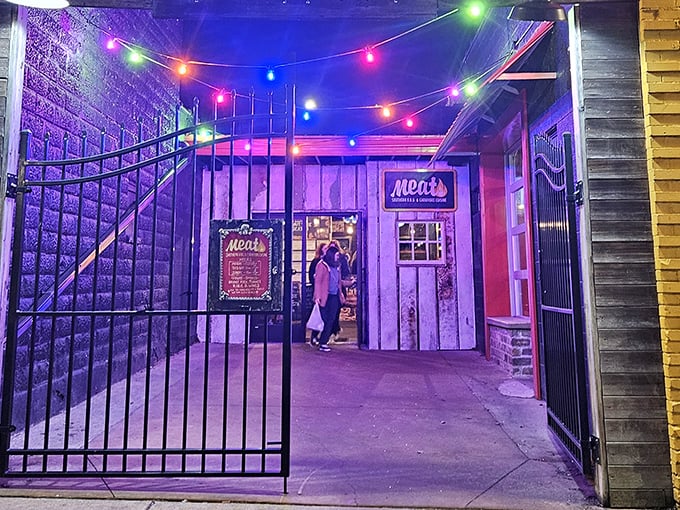When the sun goes down, Meat BBQ's colorful lights transform this alley into a carnival of carnivorous delights.