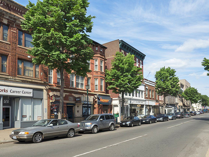 Tree-lined Main Street stretches ahead with mom-and-pop shops that remember when customer loyalty mattered most.