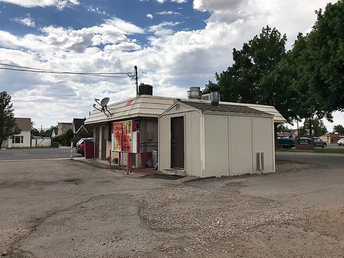 The monument stands proud in Nephi's town square, honoring history while mountains provide nature's perfect backdrop for retirement living.