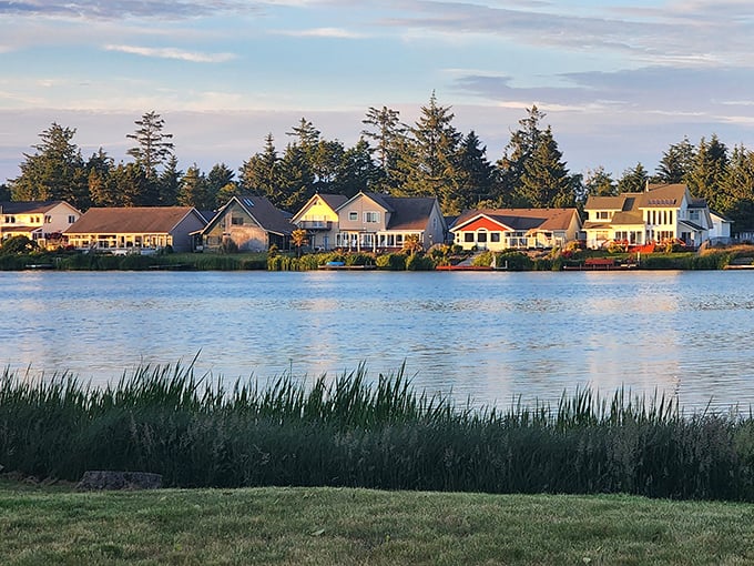 Waterfront homes catch golden hour like a Kodachrome memory, proving beach life doesn't require millionaire status.