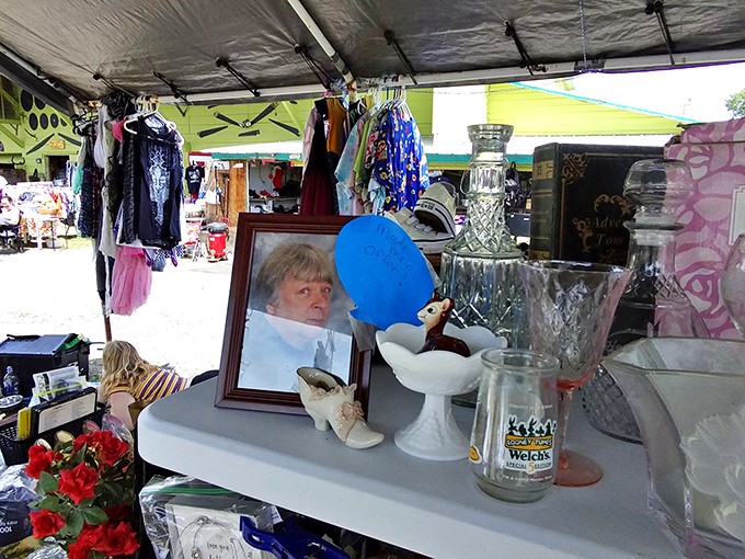 Garden whirligigs and childhood toys create a colorful tapestry against the serene St. Croix Falls landscape.