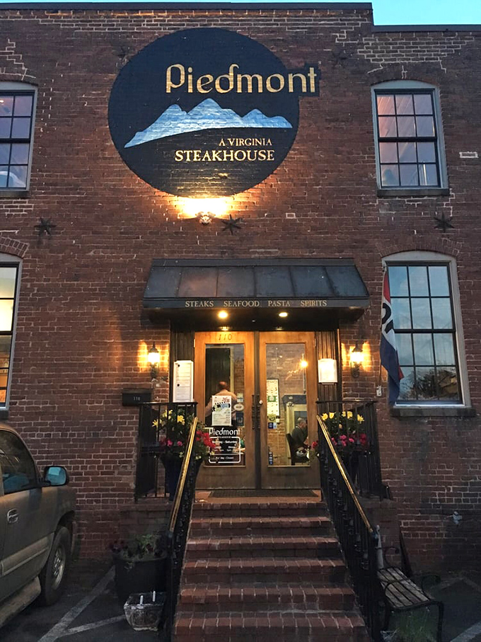 Warm light spills from Piedmont's entrance, beckoning hungry travelers like a lighthouse for the famished.