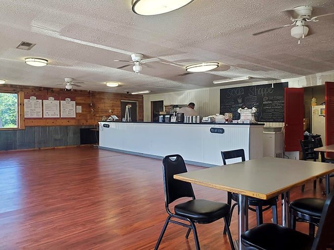 Those wooden picnic tables under the covered porch practically beg you to sit and stay awhile.